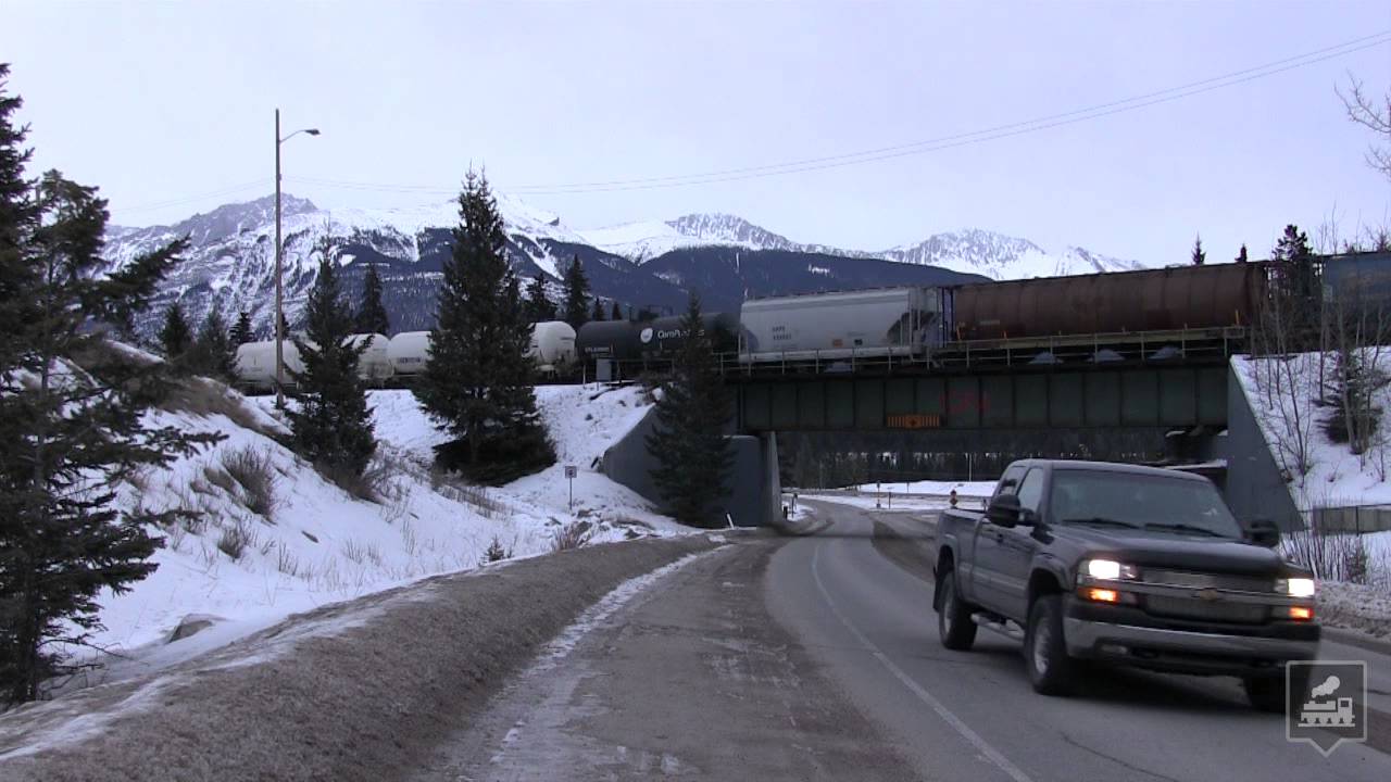CN Train Enters Jasper Yard - YouTube