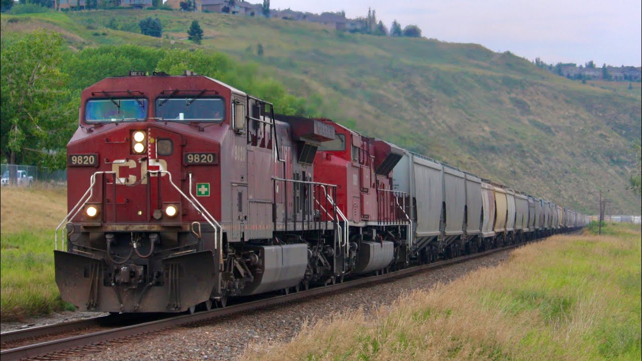 CP SD70ACu 7051!!! CP 9820, CP 7051 and CP 8724 Lead CP 301 west at Cochrane, Alberta - YouTube