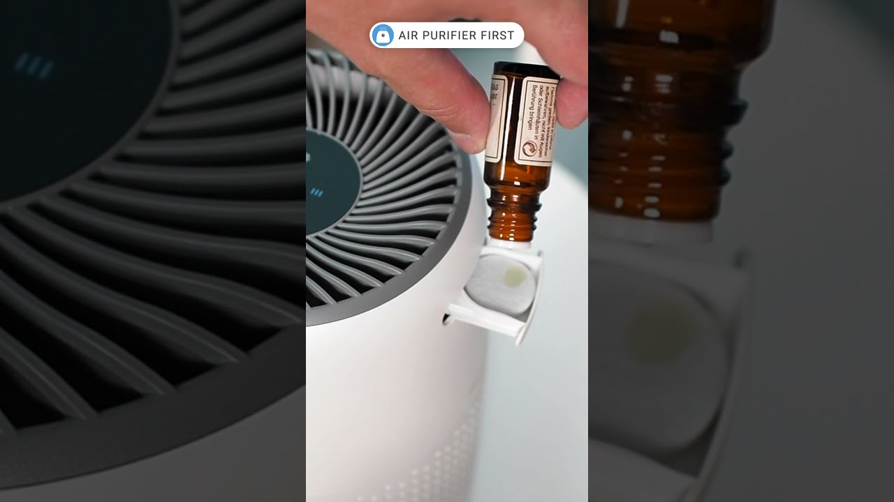 Pouring Essential Oil Into the Levoit Core Mini Aroma Pad aircleaner levoit airpurifier