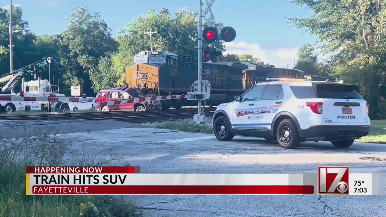 Fayetteville train plows into SUV after 2 jump out - YouTube