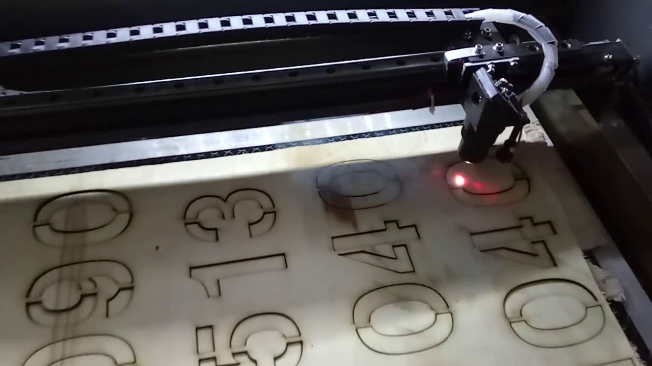 690 laser engraving machine working video - YouTube