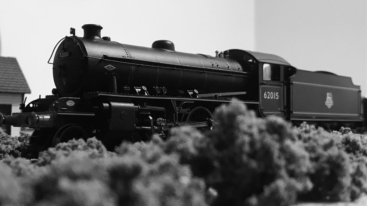 K1 leaving the station with a small freight train - YouTube