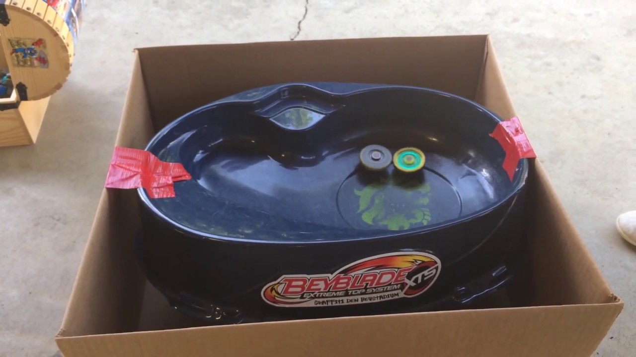 BeyBlades fighting in floating stadium! - YouTube