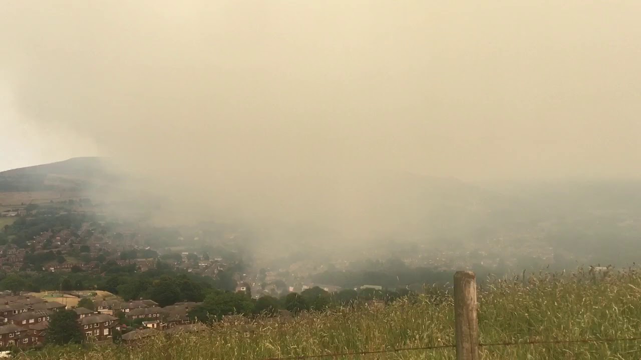 Saddleworth Moor fire Day 2, Tues 26/6/2018 looking across Mossley fro ...