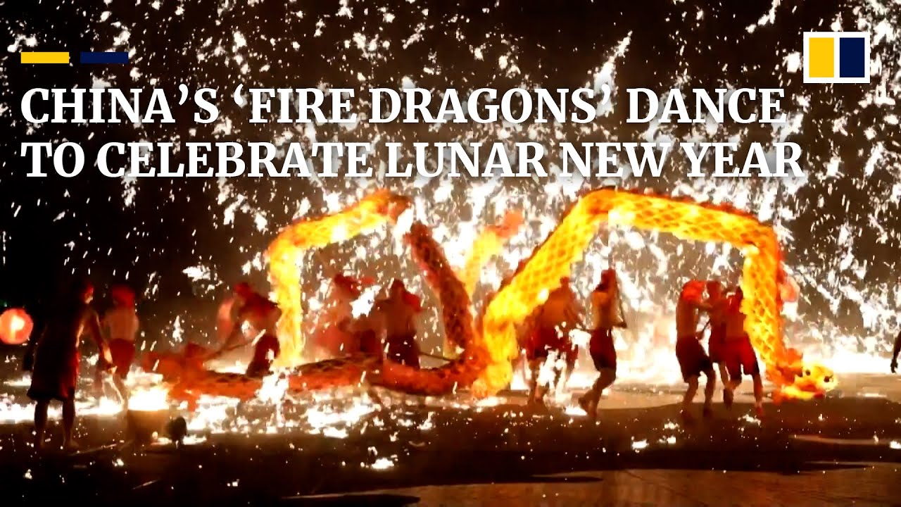 ‘Fire-breathing dragons’ dance at Lunar New Year celebration in China ...