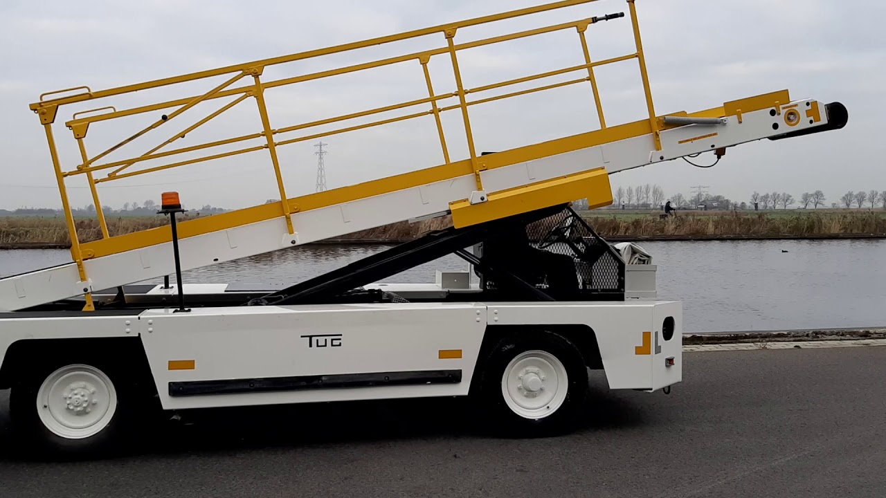 TUG 660 Conveyor Belt Loader - YouTube