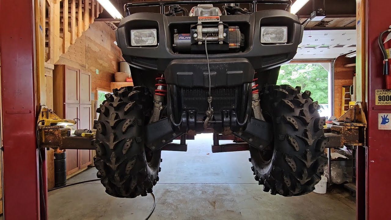 Polaris Sportsman 700 EFI / 28" TSL SWAMP LITES - YouTube