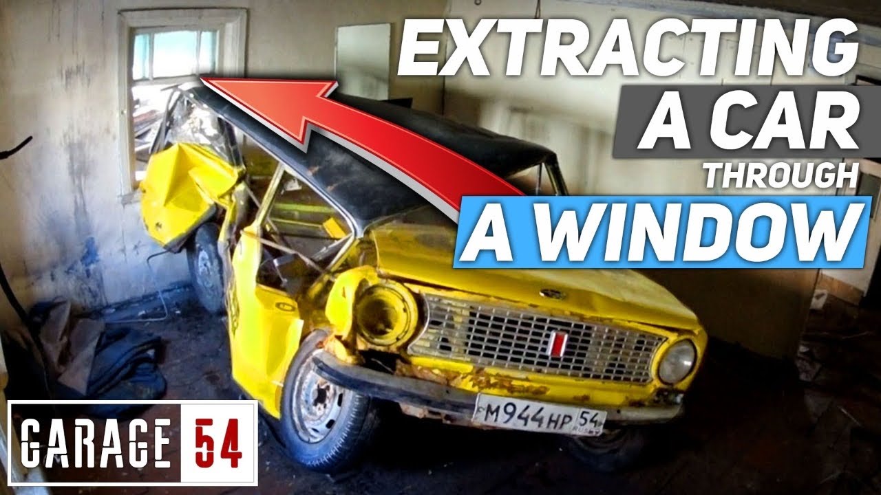 Royally f...ked: extracting a car through a window - YouTube
