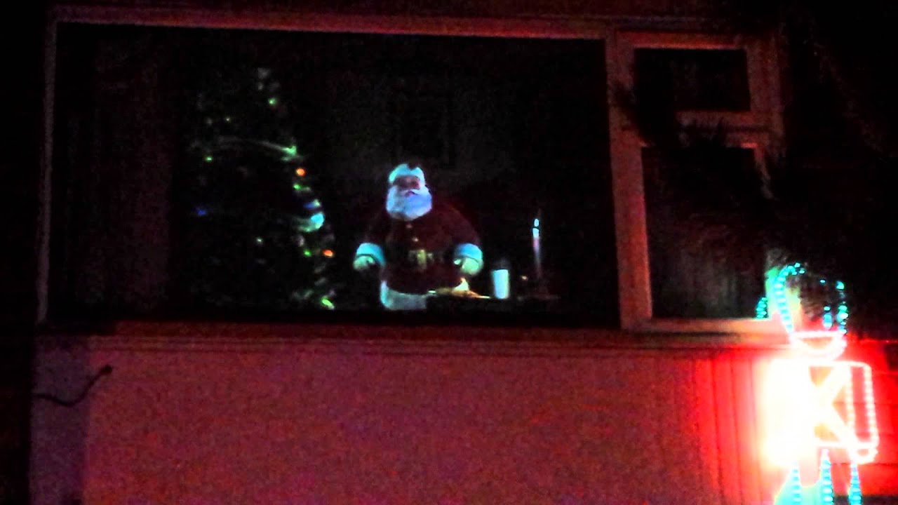 Waving santa in window - YouTube