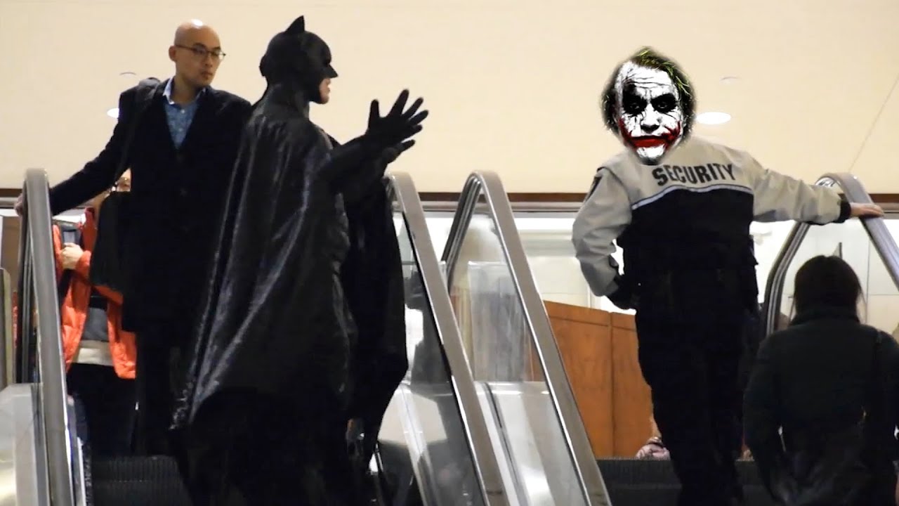 BATMAN STARING AT STRANGERS ON THE ESCALATOR PRANK 2!! - YouTube