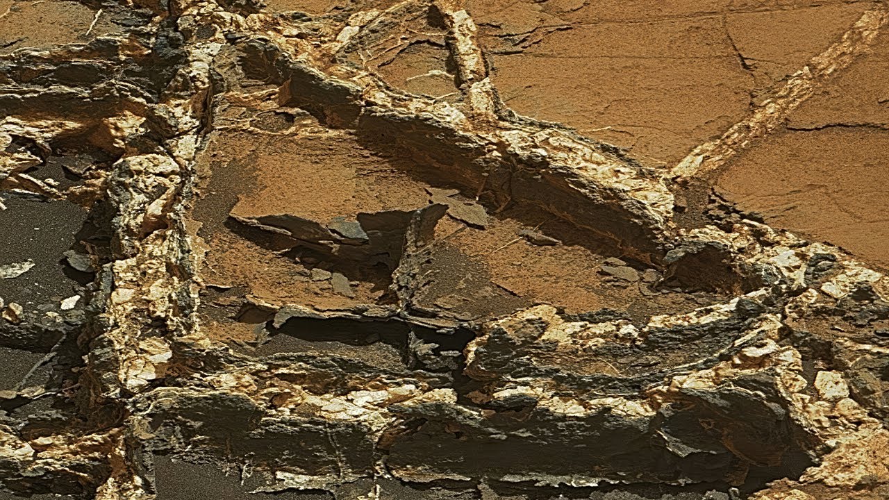 Crystalline treasures beneath weathered scars. Crystal shard veins on ...