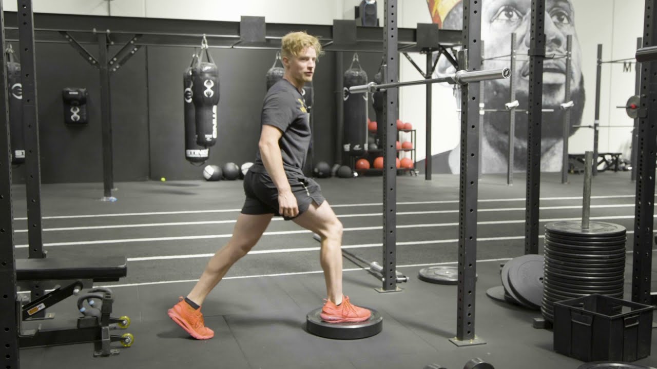 Foot Elevated Plate Lunge - YouTube