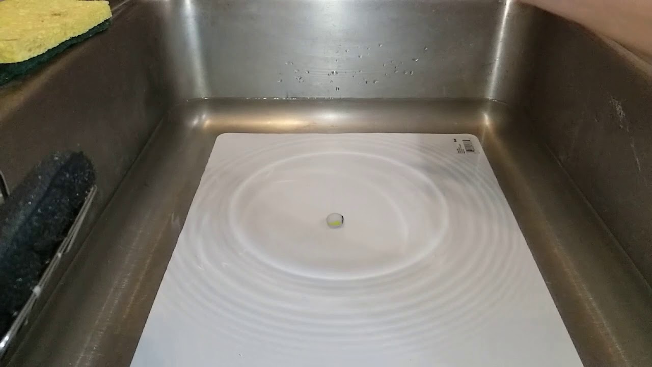 Marble dropped in water slow motion 1/8x - YouTube