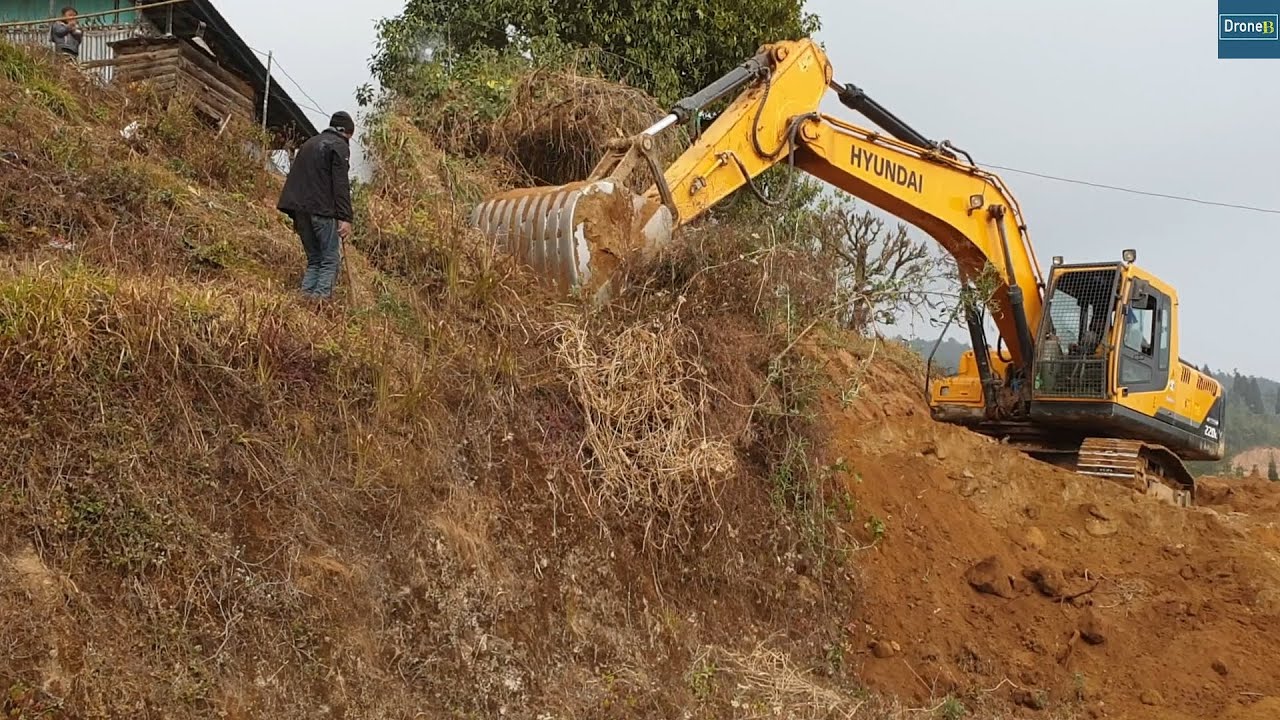 Saving Hill Top House Widening Hillside Road with Hyundai Excavator ...