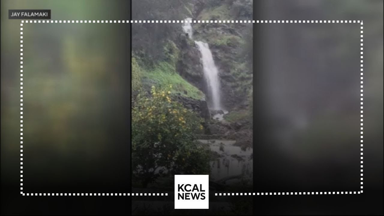 Waterfall forms in Beverly Hills as storm passes through - YouTube