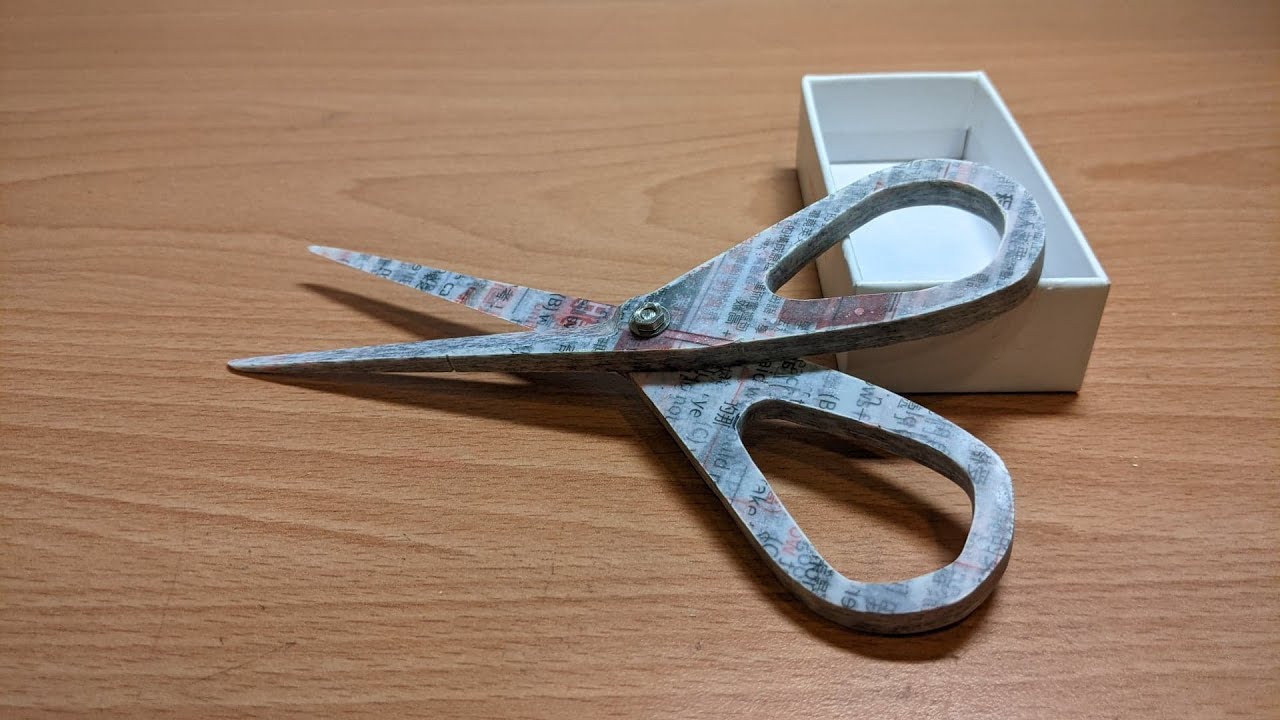 A pair of scissors—made from a book? - YouTube