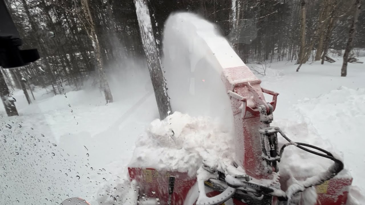 Snowblowing through deep snow in the forest. TYM T474 and Pronovost ...