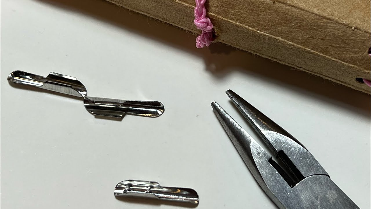 Tutorial: elastic cord closure with metal ends for junk journals - YouTube