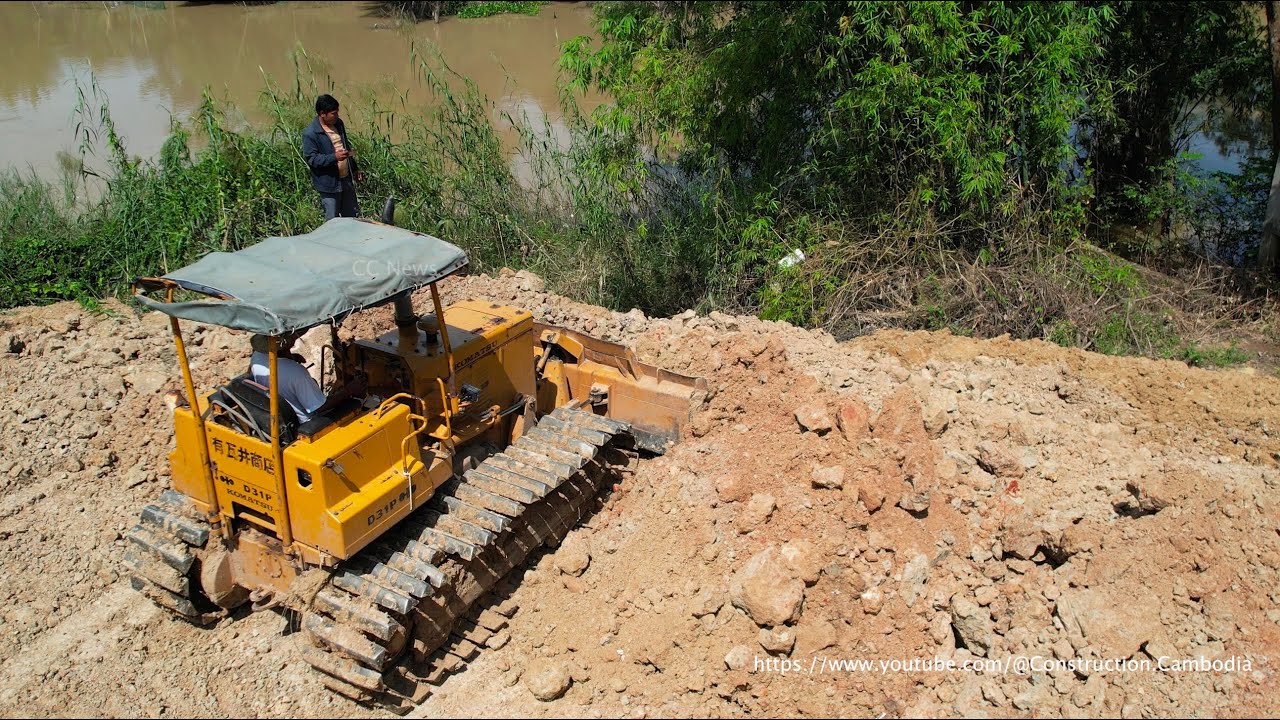 perfectly dozer d31p clearing leveling land new project with 5 ton dump ...