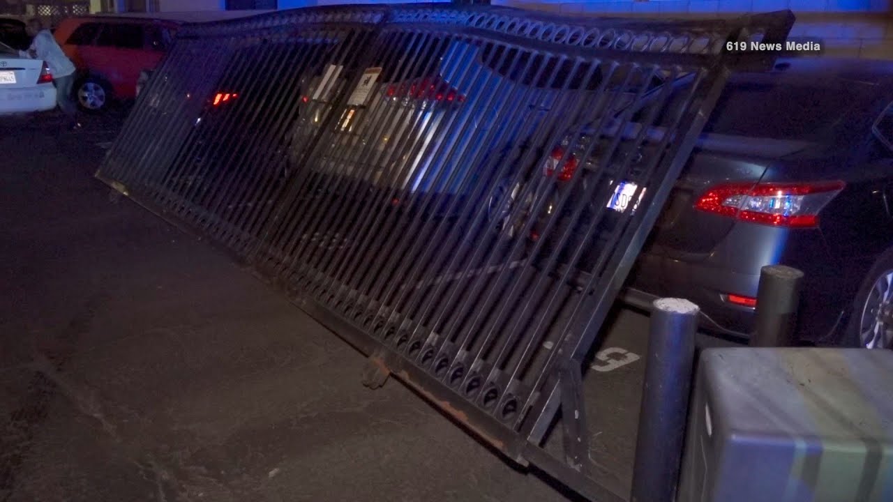 Driver Crashes Through Complex Gate - YouTube