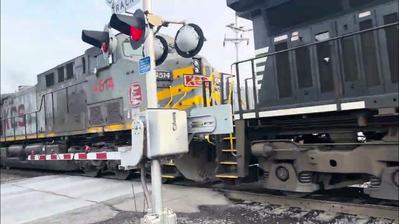 KCS Gray Ghost on NS 65E meets super fast coal train - YouTube
