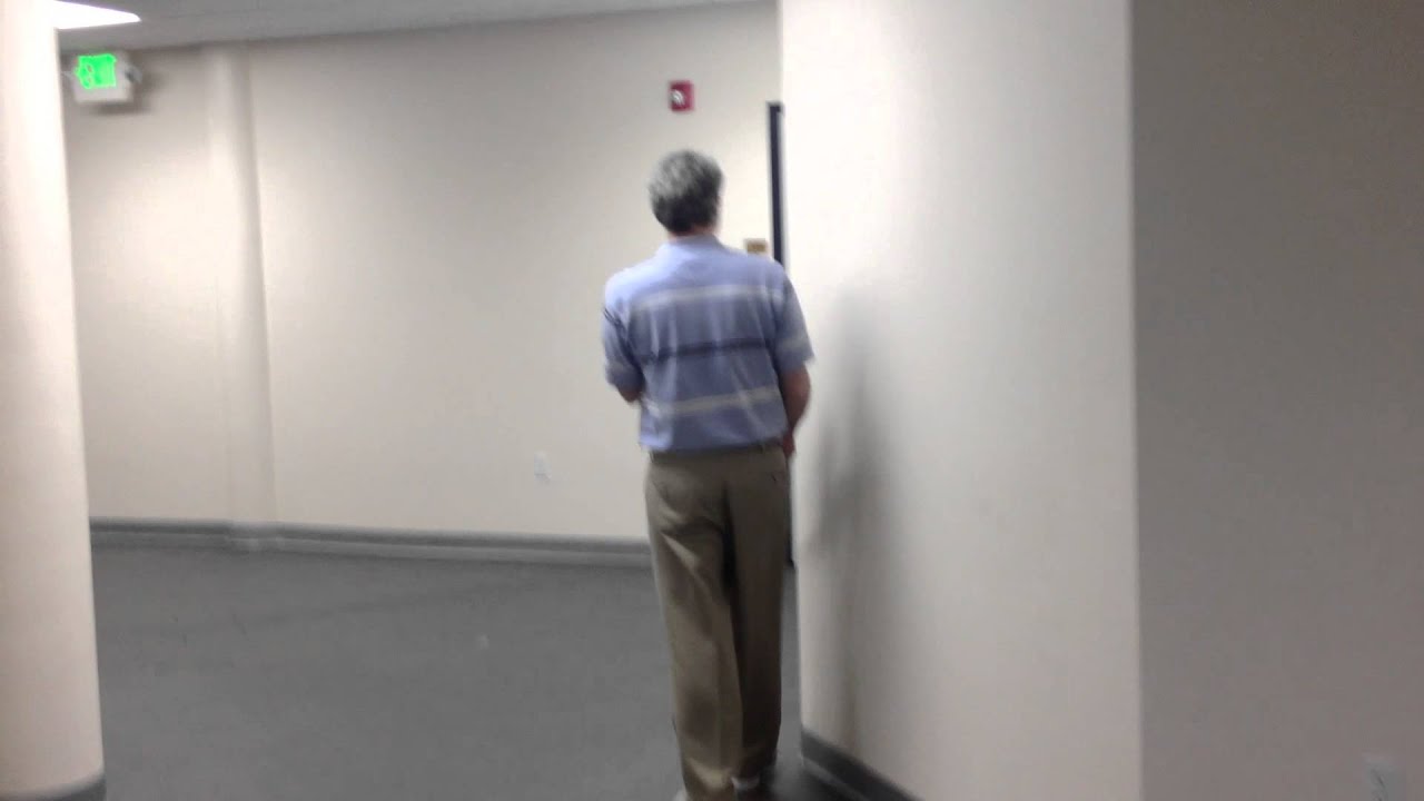 Phil Cooney navigating the hallway - YouTube