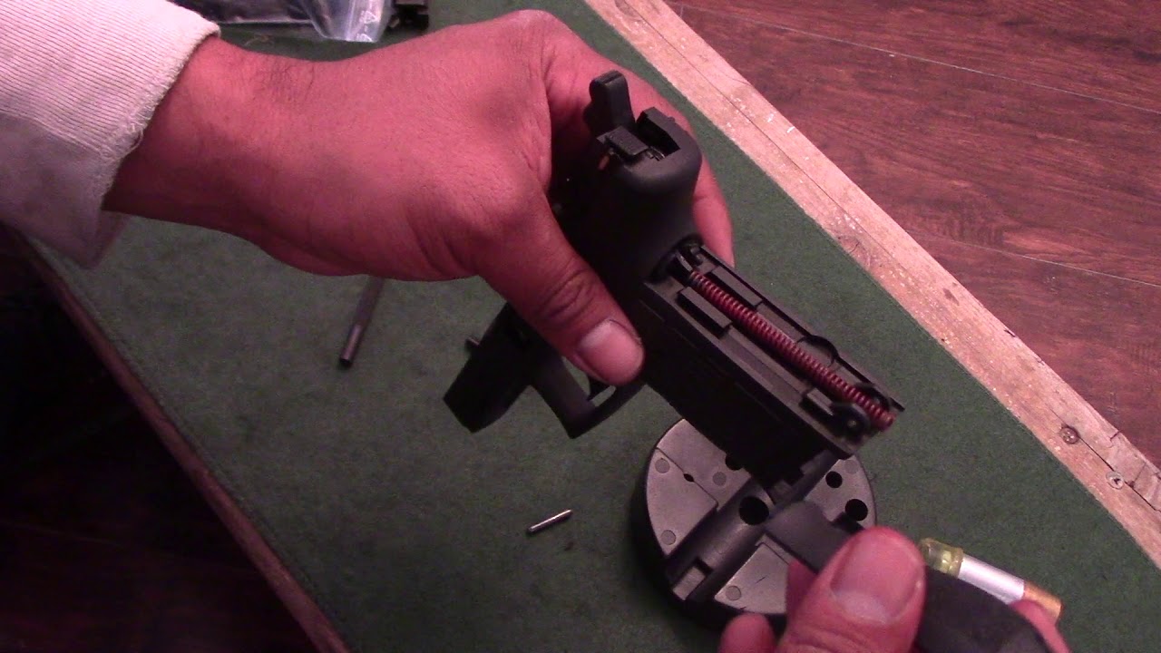 How to disassemble and change the back strap on your H&K P2000 - YouTube