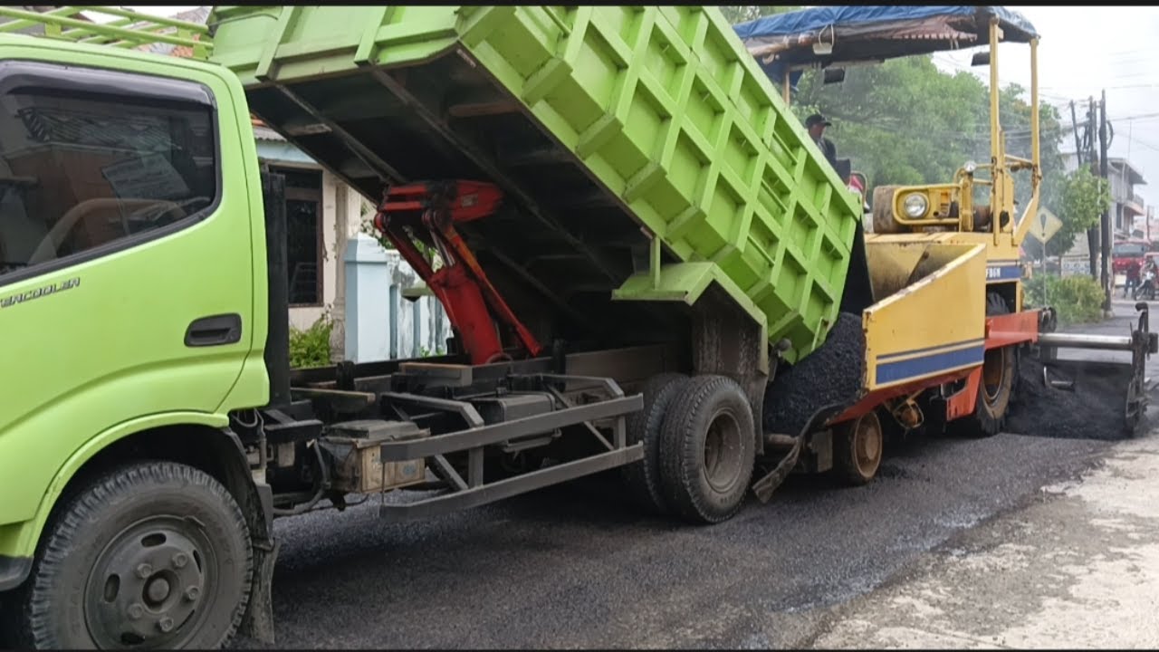 hot mix asphalting process using heavy equipment asphalt finisher ...