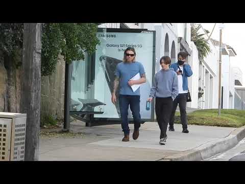 Phoebe tonkin and Sam Worthington head to set in Sydney
