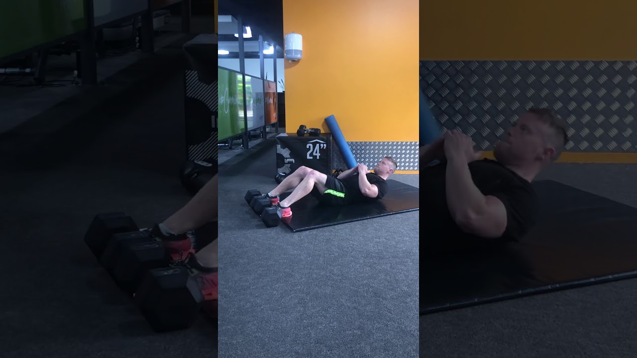Sit ups tuck feet under dumbbells - YouTube