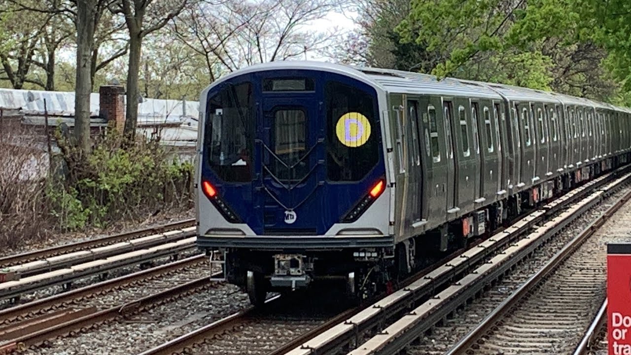 R211T “D” Train passing by Ave J - YouTube