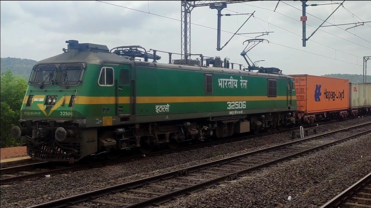 Electric Locomotive WAG 9HC with container train halted for crossing ...