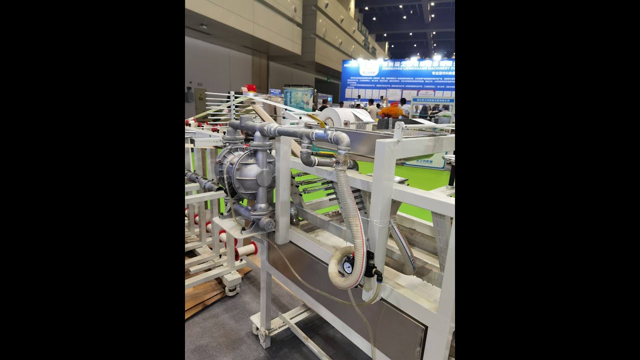 CNC auto paper core machine was shown its working process to people at ...