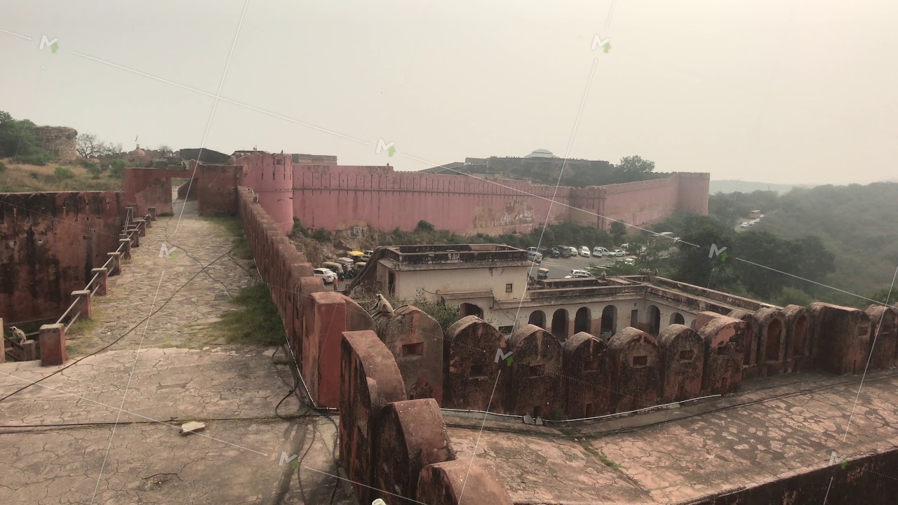 Jaipur, India - ancient walls of the fort and view of the mountains ...