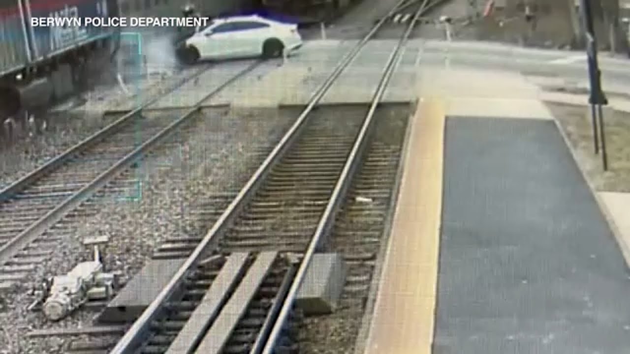 Car struck by Metra in West Suburbs; driver unharmed - YouTube