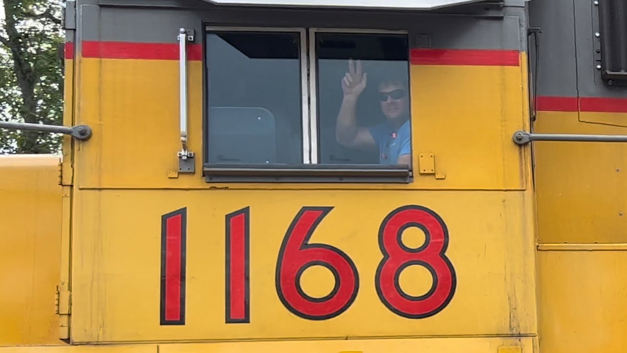 UP 1168 w/ the friendly crew leading the local through Conway! - YouTube