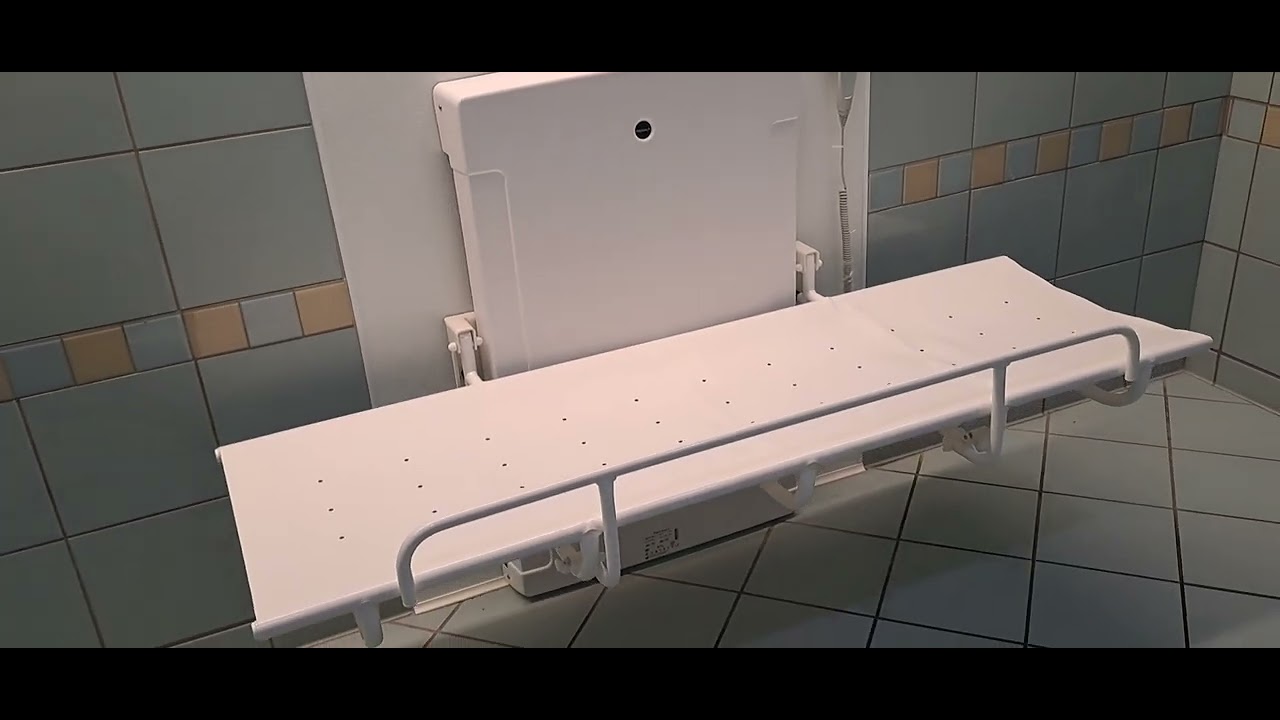 Adult diaper changing table at the airport - YouTube