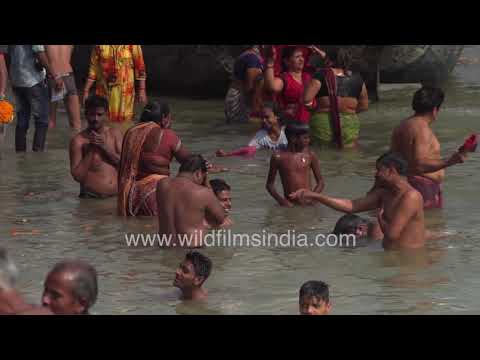 Mass bathing at the Ganga River in India | The Holy Dip