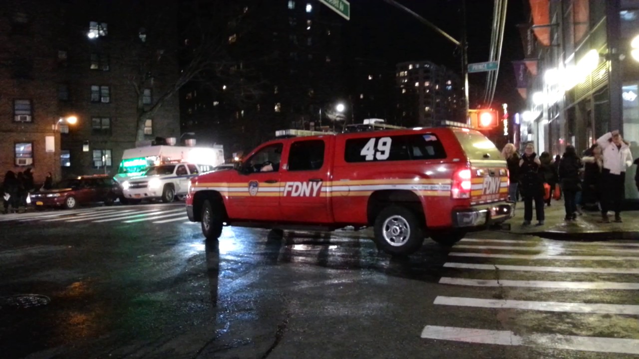 FDNY battalion 49 taking up from a 4 alarm fire on Roosevelt Ave & Main ...