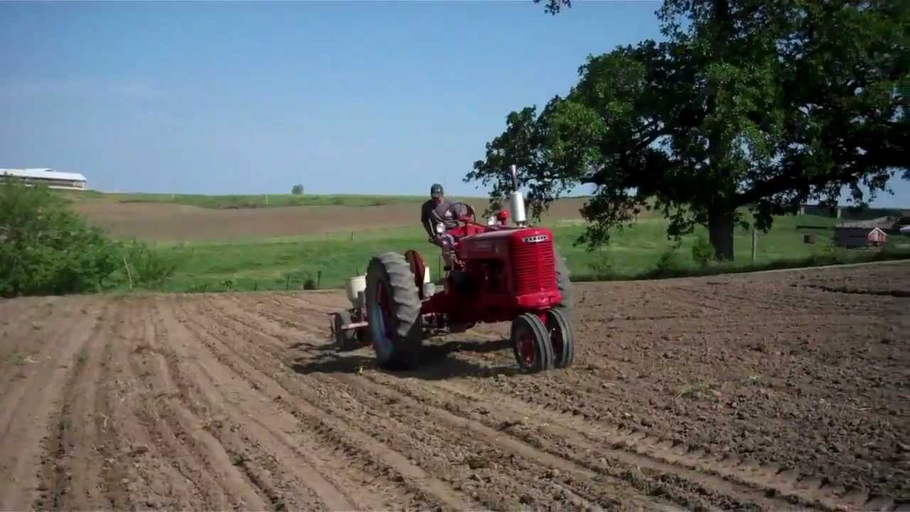 planting sweet corn 2012 with M farmall - YouTube