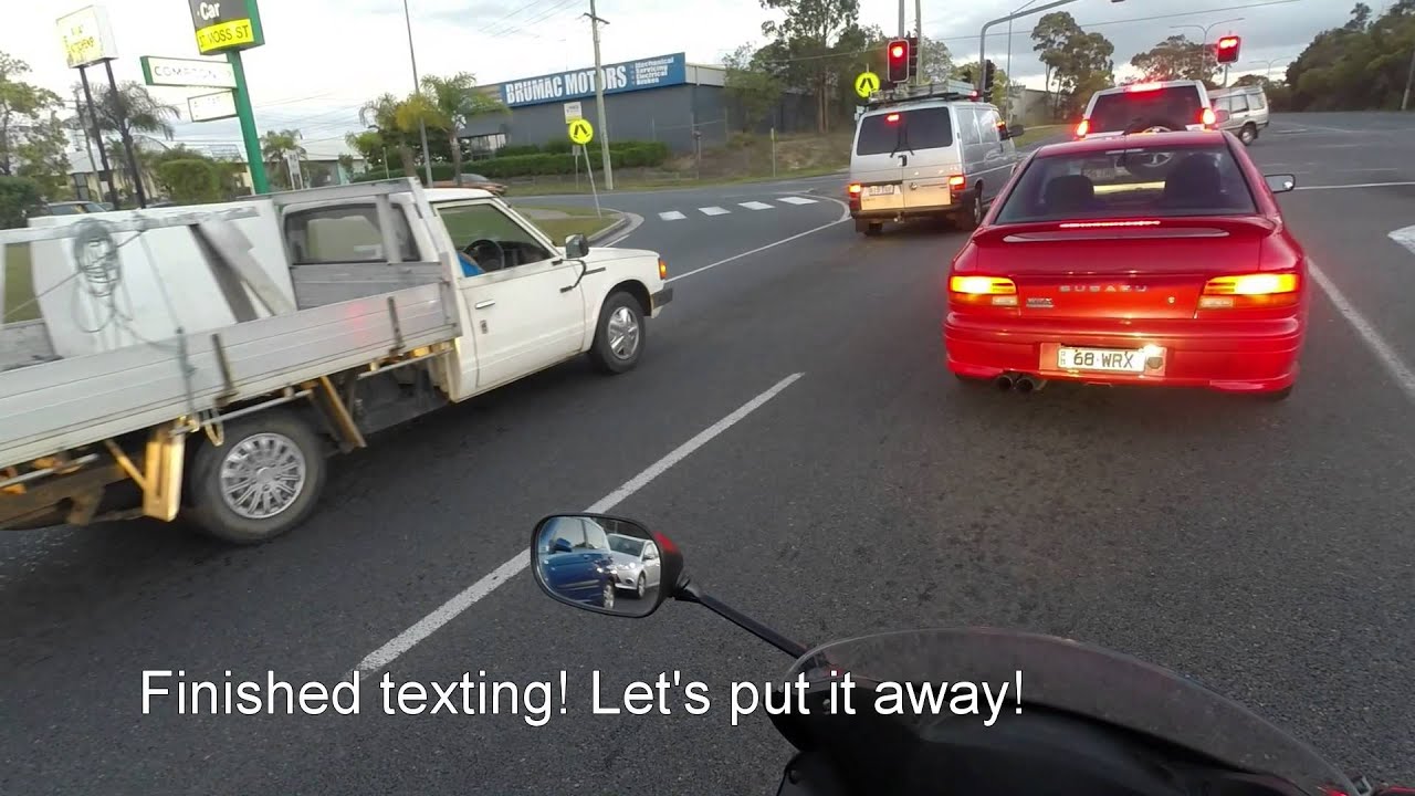 Driver caught texting whilst driving - YouTube