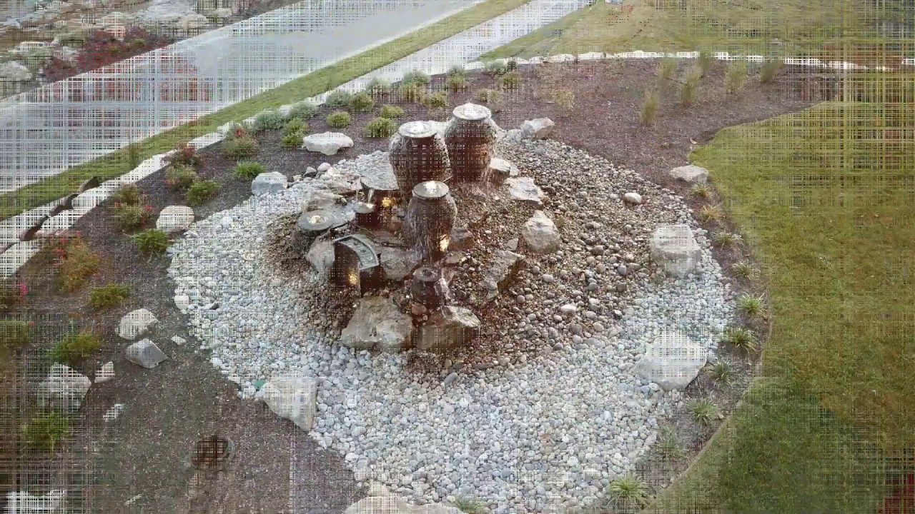 Beautiful custom water feature fountain at a subdivision entrance - YouTube