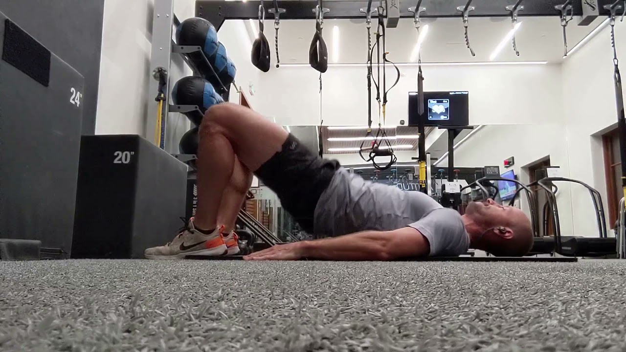Glute Bridge with Tail Tucked (posterior pelvic tilt) - YouTube