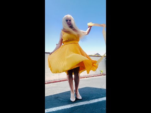 Orange pleated windy dress