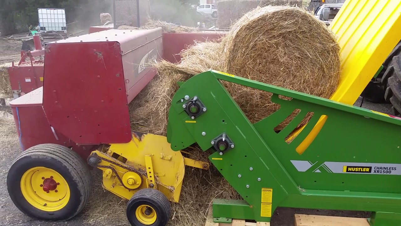 Hustler Chainless XR1500 Demo, feeding round bales into a small square ...