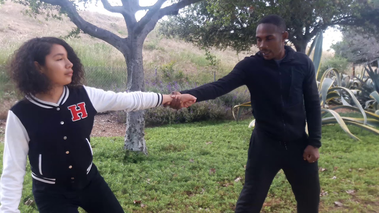 Strong grip. He grab her by the arm. How can she defend herself? - YouTube