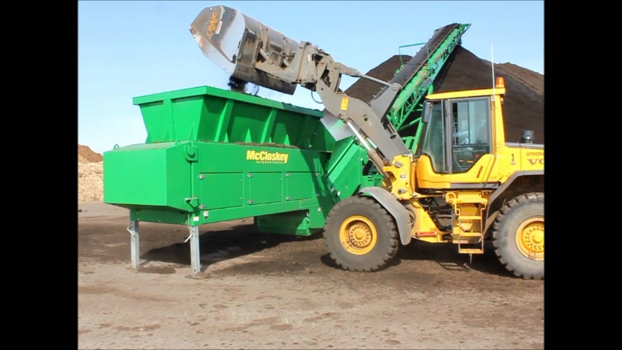 2012 McCloskey Tracked Feeder Stacker - YouTube
