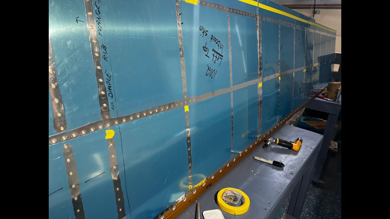 Vans RV10 Build Top wing skin riveting Part 1 - YouTube