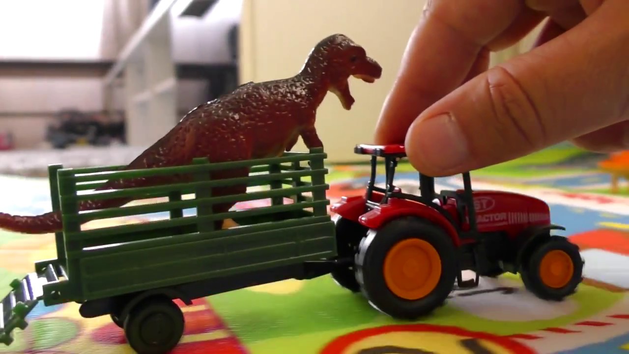 TOY TRACTOR TRANSPORTATION OF DINOSAURS - YouTube