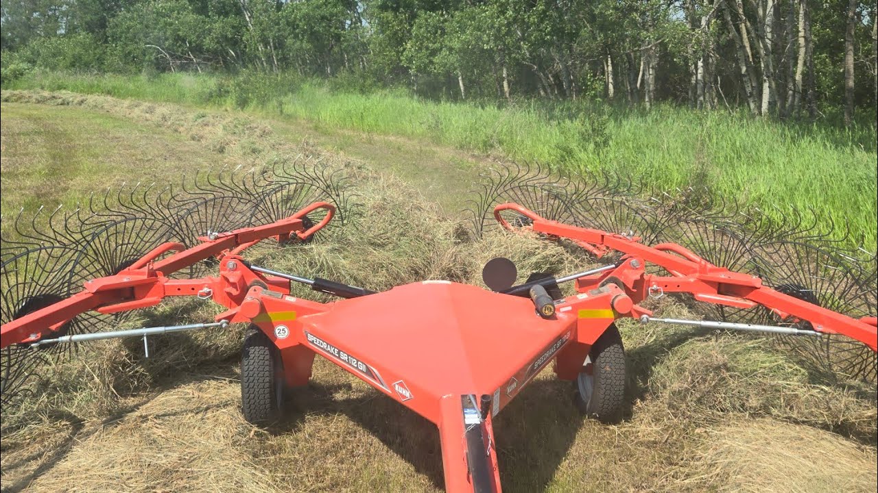 Raking and Baling First Field - YouTube